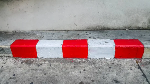 Red and White sign on the sidewalk background - Stock Image - Everypixel