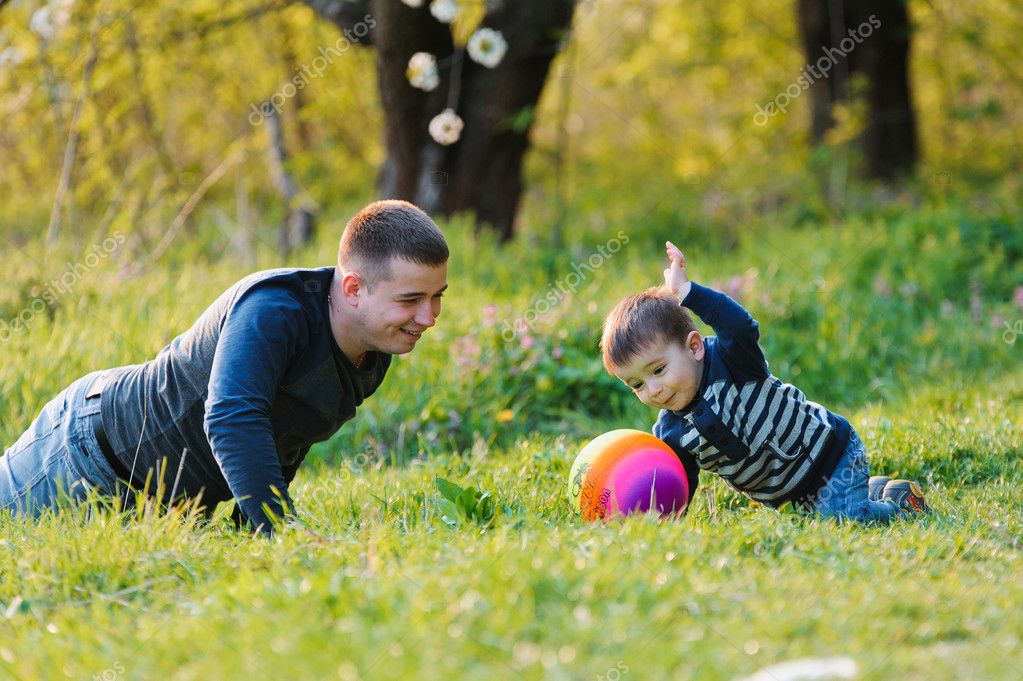 Father and son playing ball — Stock Photo © Lisovoy #72453525