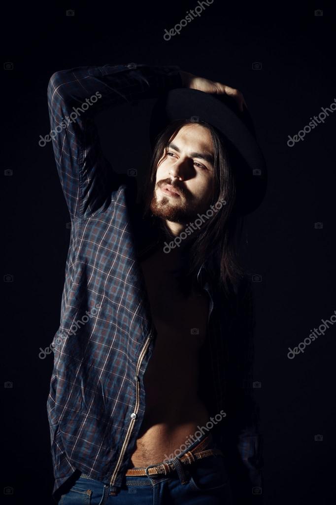 Handsome young bearded man Stock Photo by ©Yafimik 81964858