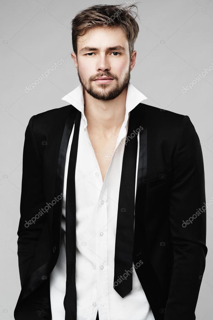 Fashion man in suit Stock Photo by ©Yafimik 81988976