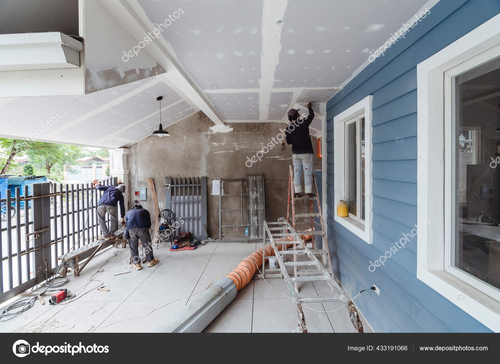 Several Construction Worker Finishing Works Carport Area House Example ...