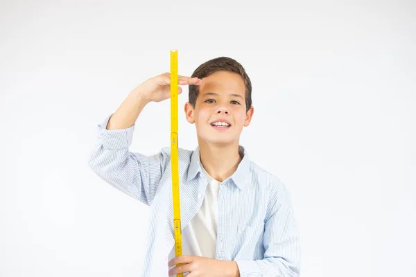 Kid measuring height Stock Photos, Royalty Free Kid measuring height ...