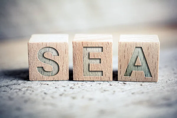 SEA Search Engine Advertising Written On Wooden Blocks On A Board ...