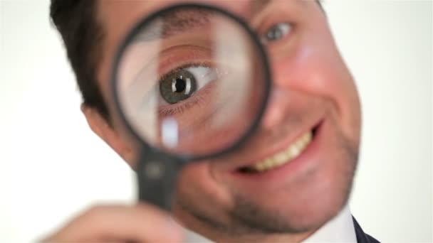 Man looking with magnifying glass Stock Photo by ©get4net 1147774