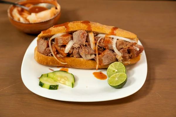 Pastel de cerdo ahogado con salsa. Comida t pica mexicana de ...