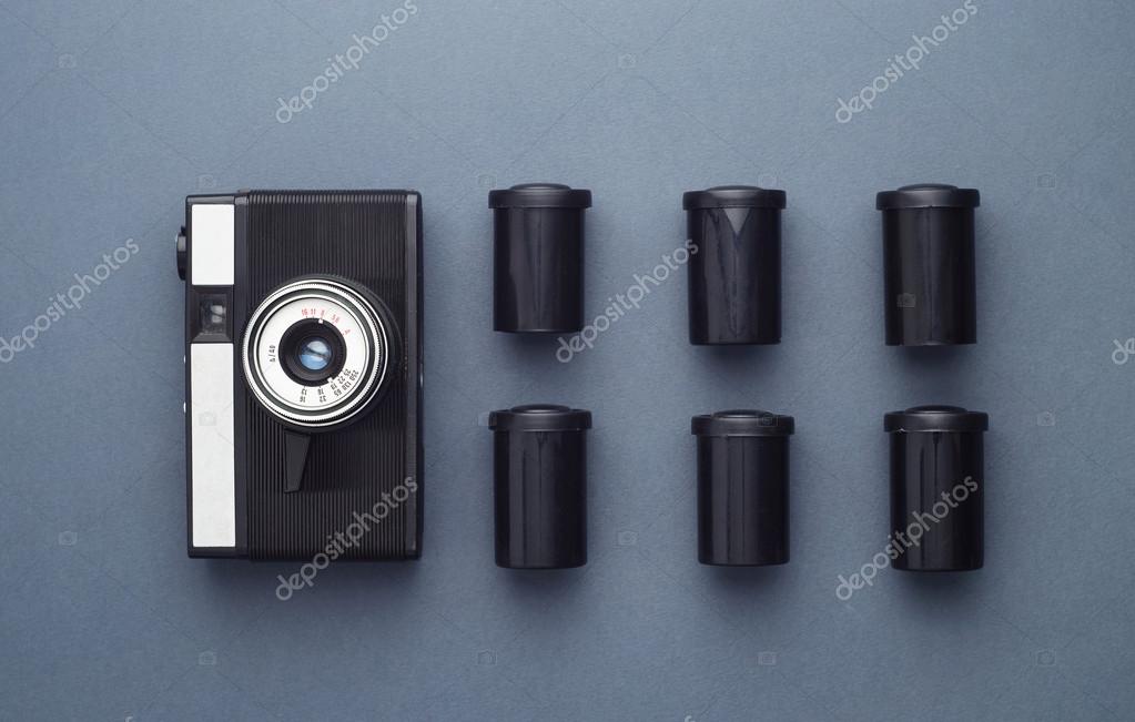 Photo Camera and camera film roll — Stock Photo © bogdandreava #117425532