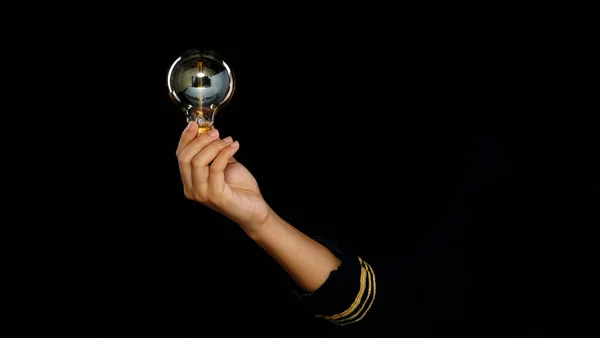 Man carrying a light bulb Stock Photos, Royalty Free Man carrying a ...