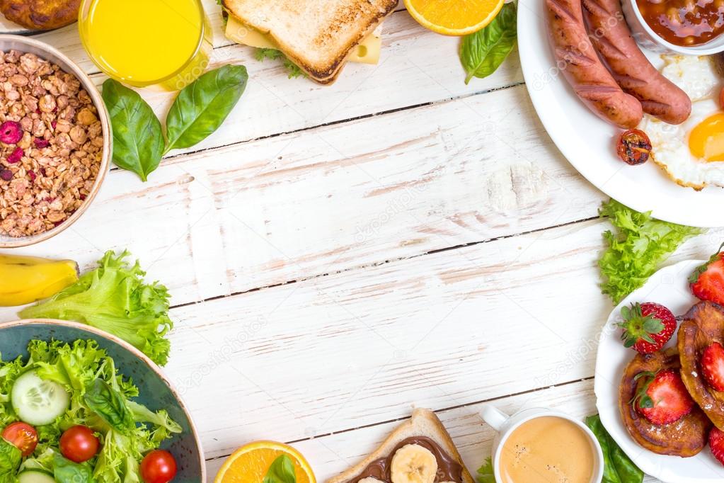 Different types of breakfast background Stock Photo by ©somegirl 105462330