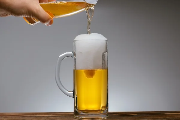 Overflowing beer mug — Stock Photo © vipmen #87860170