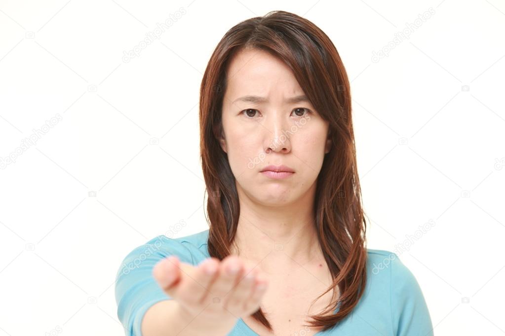 Angry Japanese woman requests something — Stock Photo © deeblue #112069234