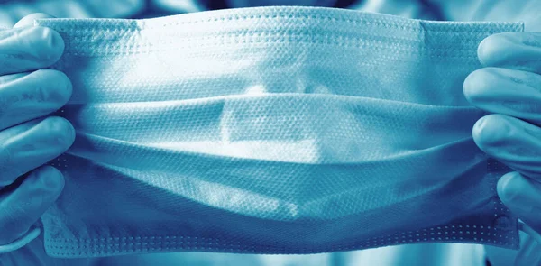 Typical surgical mask to cover mouth, nose. Protection concept, against ...