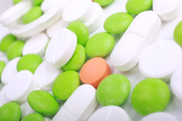 Stack of different pills isolated on white background - Stock Image ...