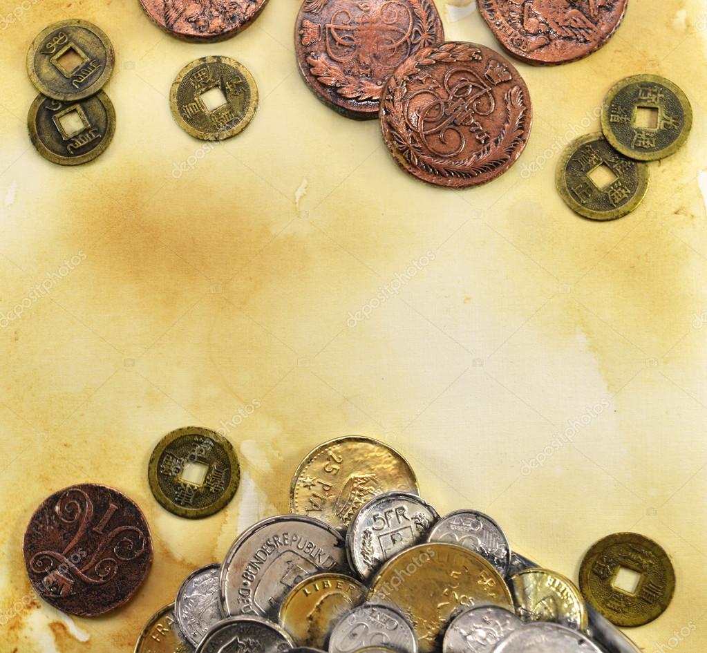 Ancient coins on paper background Stock Photo by ©Samiramay 65480485
