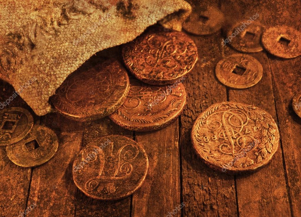 Ancient coins on n background Stock Photo by ©Samiramay 66032241