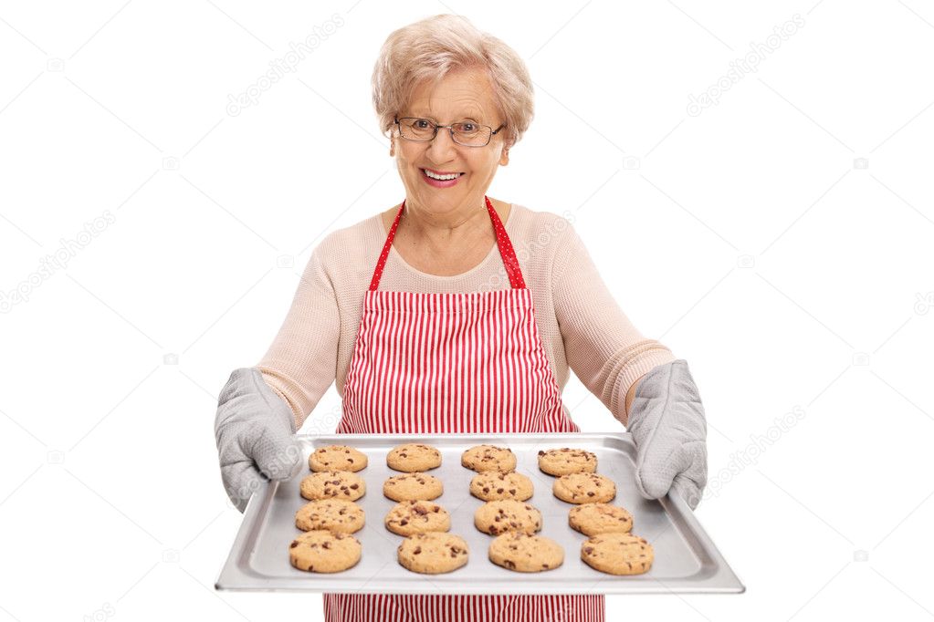 Lady handing a tray with cookies — Stock Photo © ljsphotography #109157018