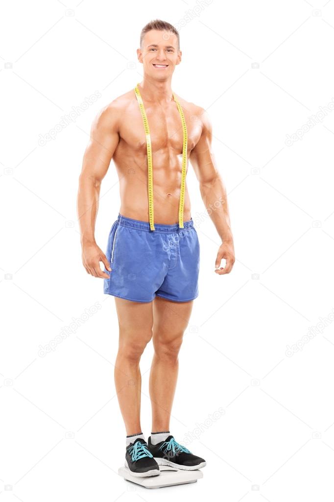 Man standing on weight scale — Stock Photo © ljsphotography #54040793