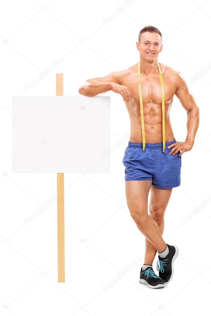 Man standing by blank banner Stock Photo by ©ljsphotography 56628305