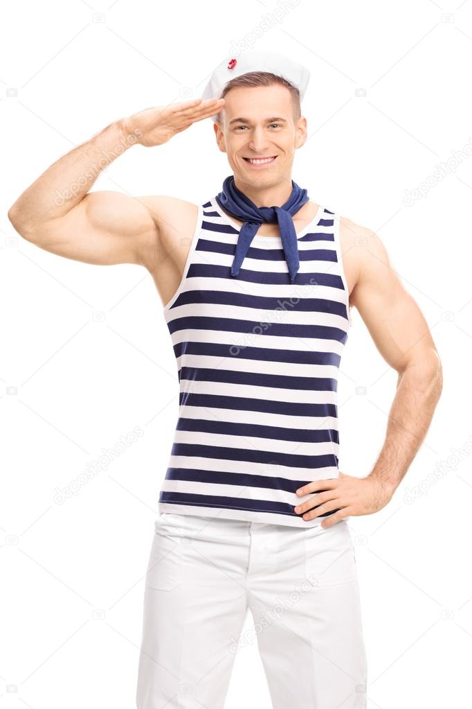 Handsome sailor making a salute gesture — Stock Photo © ljsphotography ...
