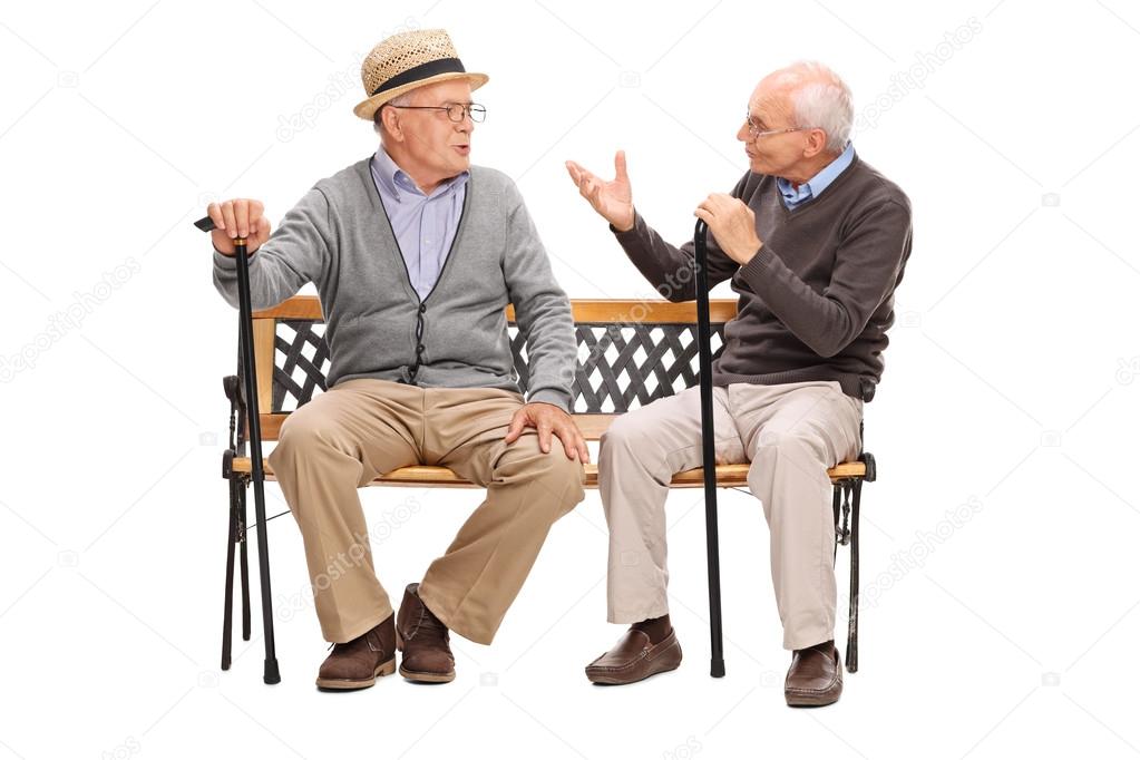 Two senior gentlemen having a conversation Stock Photo by ...