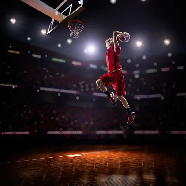 Red Basketball player in action Stock Photo by ©103tnn 72053325