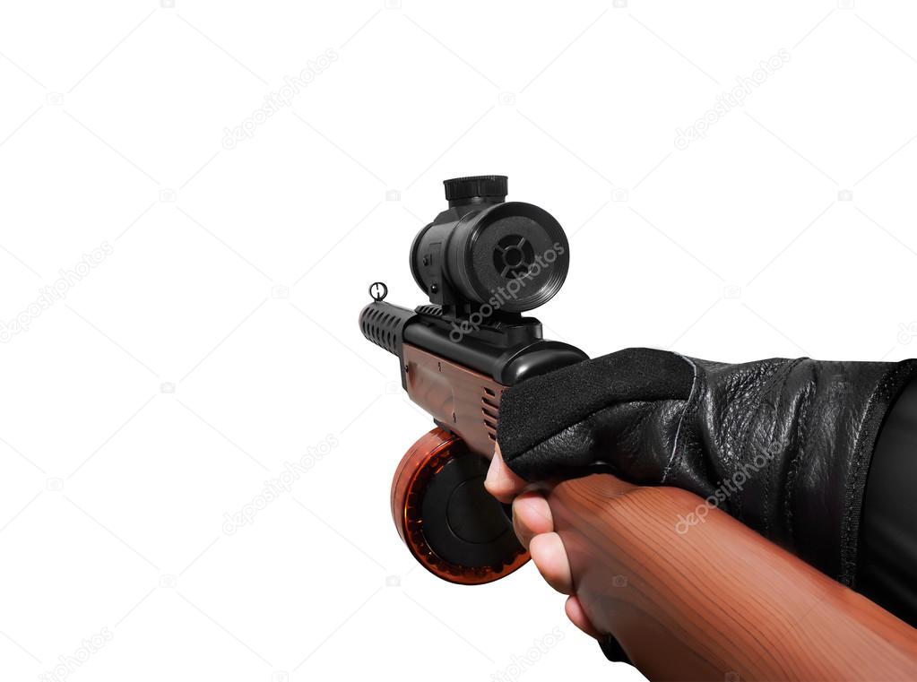 Hand holding automatic gun. — Stock Photo © breakermaximus #84654910