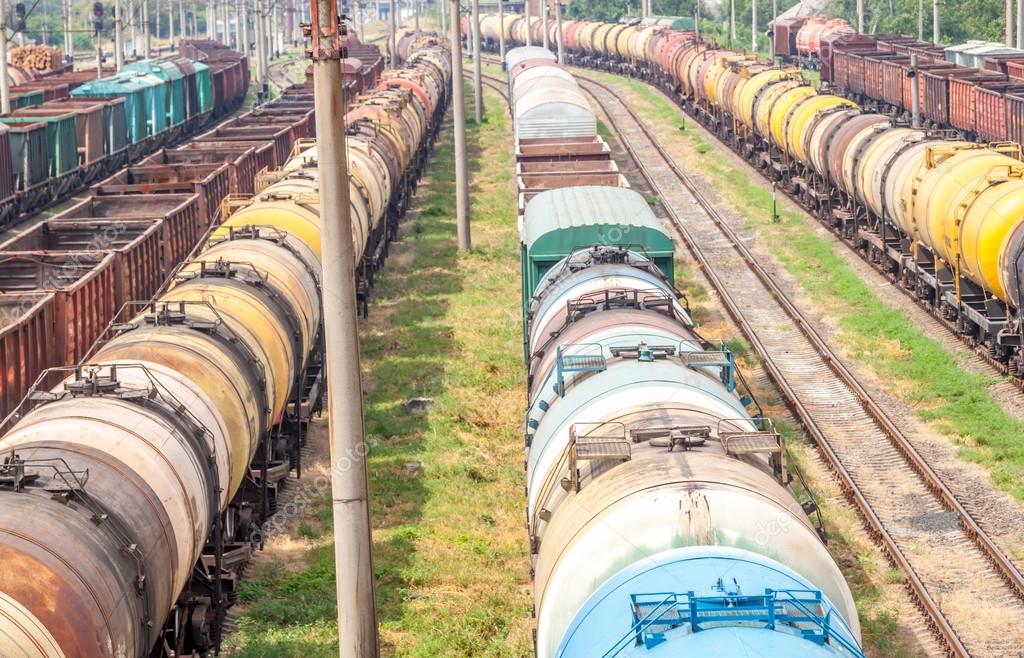 Many trains with cargo wagons Stock Photo by ©ChechotkinAnton 108929898