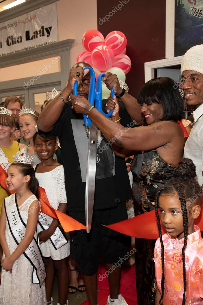 Founder /Owner Susan Jackson cutting ribbon at Grand Opening of Sushi ...