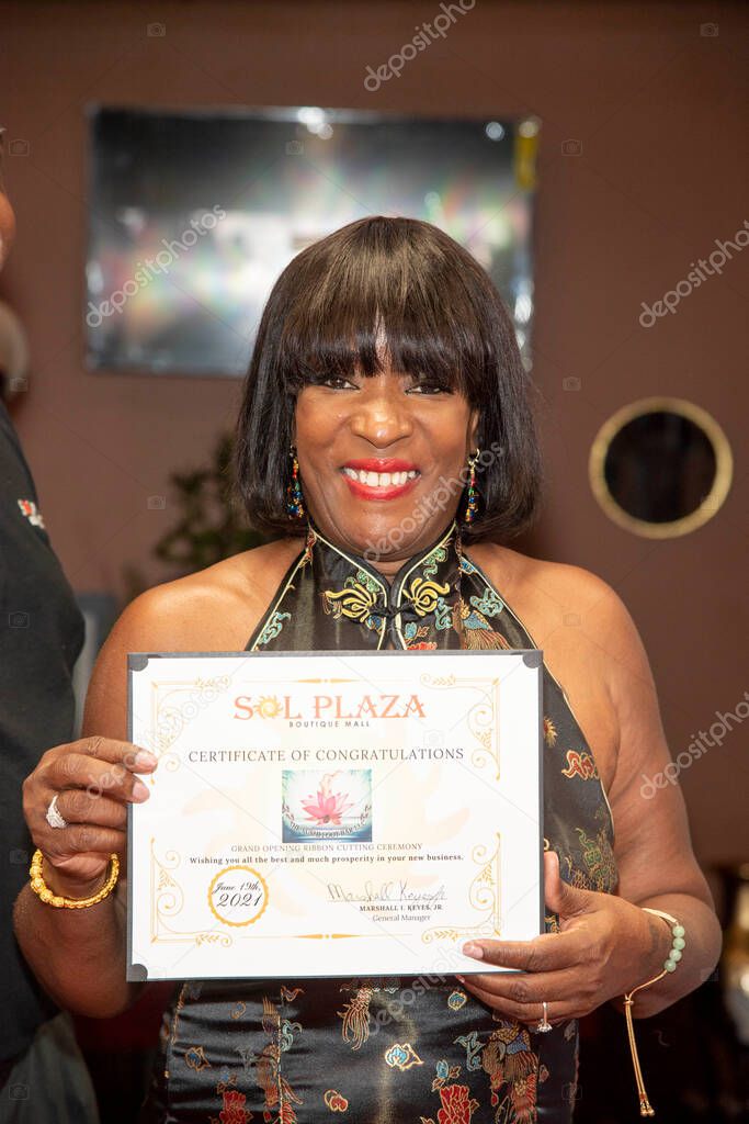 Founder /Owner Susan Jackson receives certificate at Grand Opening of ...