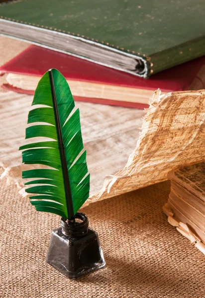 Quill pen and papyrus sheet Stock Photo by ©siculodoc 100036254