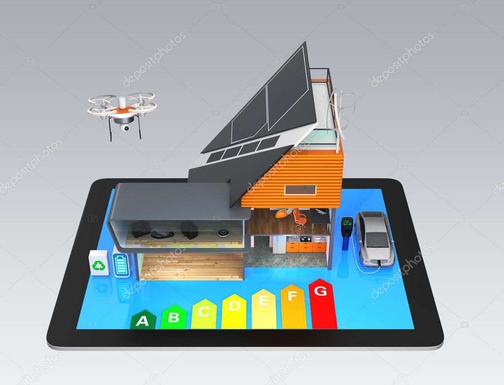 Smart house on a tablet PC isolated on gray background, with energy ...