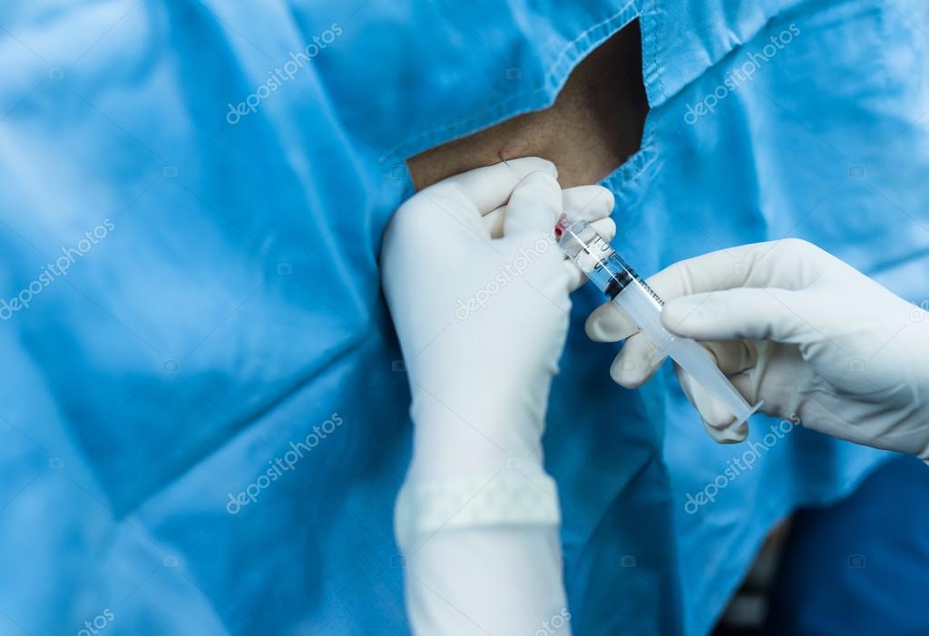 Doctor do spinal nerve block — Stock Photo © chanawit #86043412