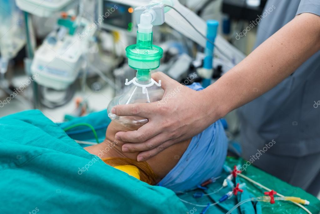 Pre oxygenation chin up position with holding oxygen mask ready ⬇ Stock ...