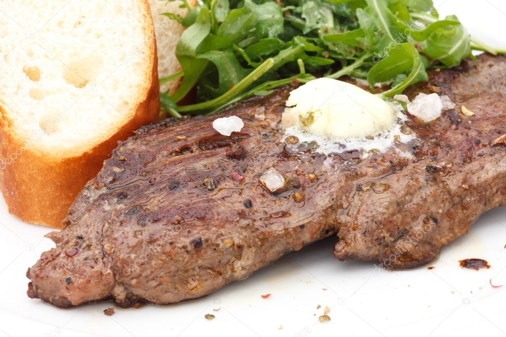 Perfect roast pork rib eye steak with baguette Stock Photo by ...