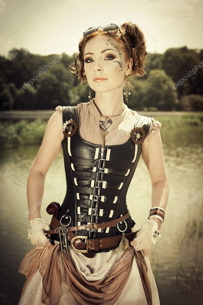Beautiful Steampunk Redhair Woman With Body Art On Her Face Outd