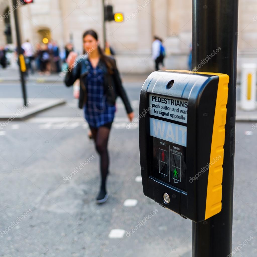 Pedestrian button at a pedestrian crossing in London, UK Stock Photo by ...