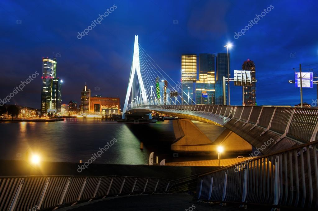 Rotterdam with the Erasmus Bridge at night in Rotterdam, Netherland ...