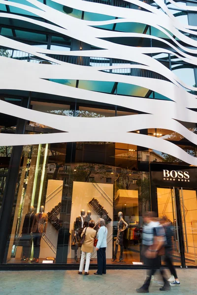 Boss store with a modern house facade in Barcelona, Spain - Stock Image ...