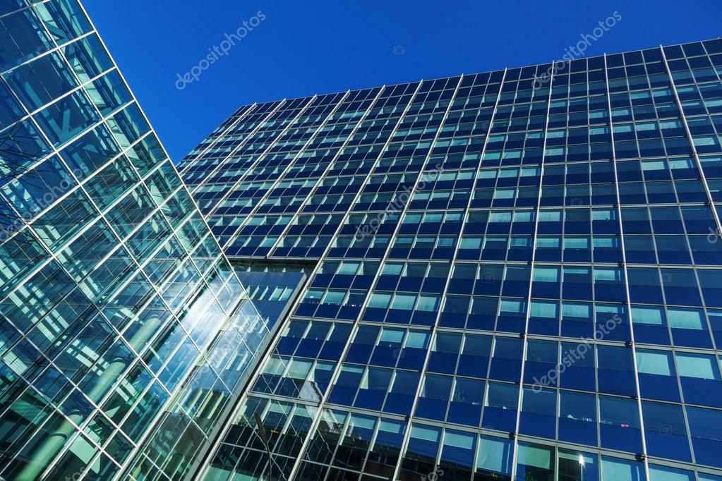 Facades of office buildings — Stock Photo © Madrabothair #56277823