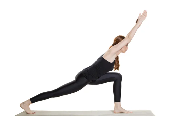 Yoga High Lunge Pose - Anjaneyasana Stock Photo by ©rilueda 115208936