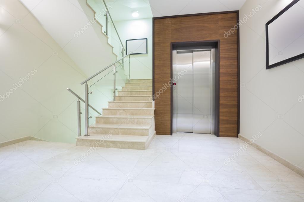 Elevator and stairs in modern building — Stock Photo © rilueda #63145495