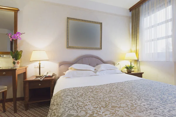 Classic style hotel room interior — Stock Photo © rilueda #73093617