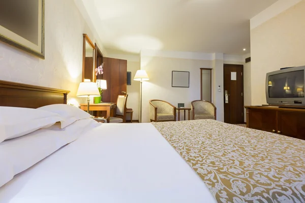 Classic style hotel room interior — Stock Photo © rilueda #73093617