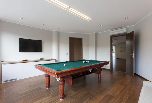 Pool table and family room — Stock Photo © lmphot #8701935