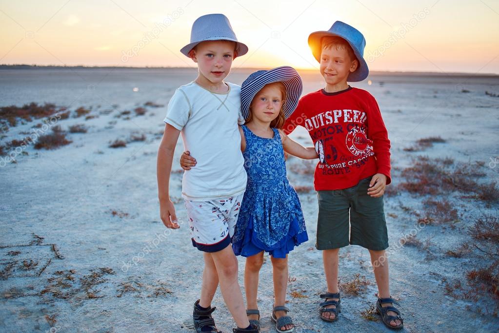 Kids in the desert Stock Photo by ©matehavitaliy 84364304