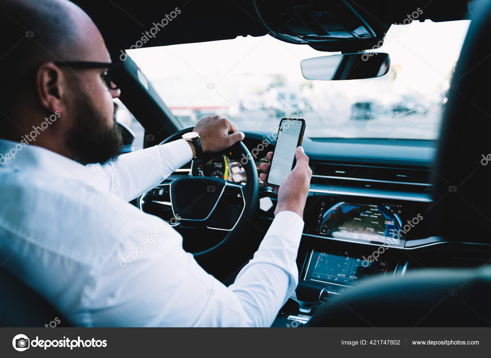 Back View Male Driver Reading Received Email Message While Steering ...