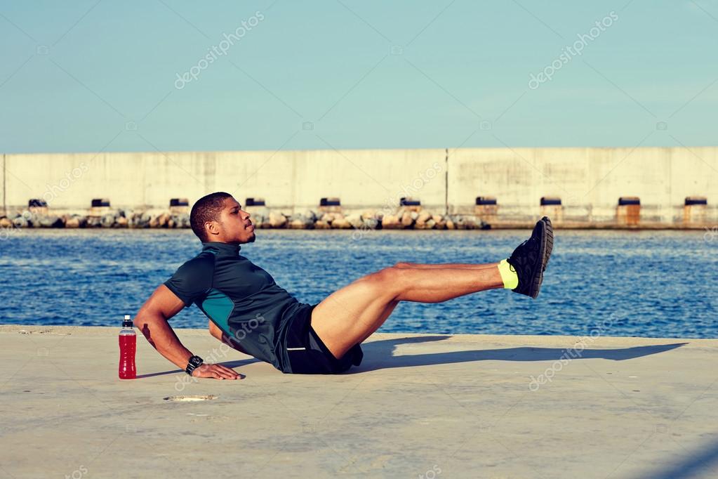 Man doing physical exercise — Stock Photo © GaudiLab #79862930
