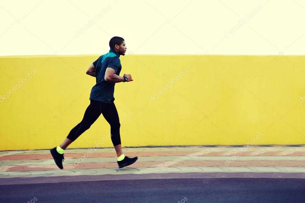 Strong body male runner Stock Photo by ©GaudiLab 79864064