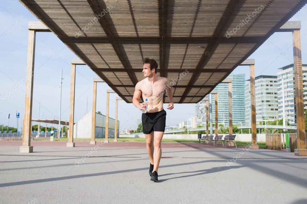 Handsome male engaged in active sports Stock Photo by ©GaudiLab 81654730