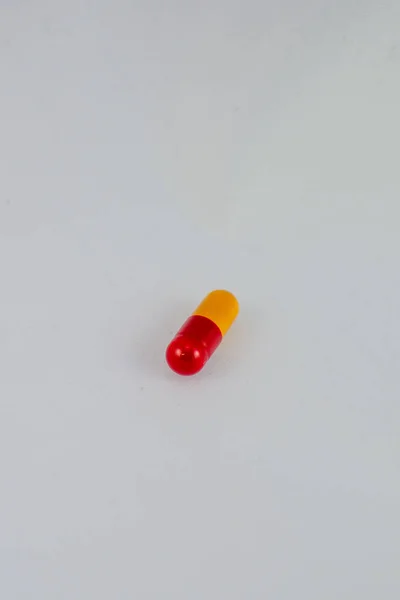 Red yellow capsule pill Stock Photos, Royalty Free Red yellow capsule ...