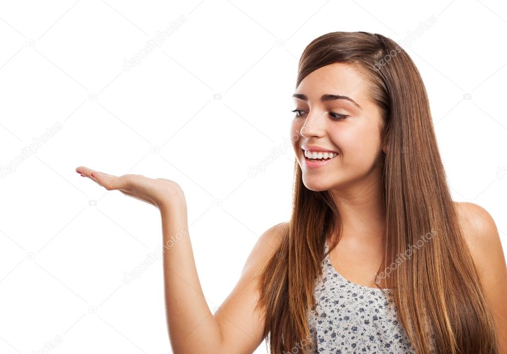 Pretty young woman holding something — Stock Photo ...